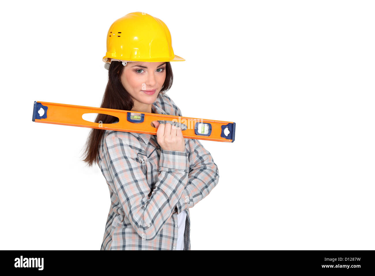 Woman with a spirit level Stock Photo - Alamy