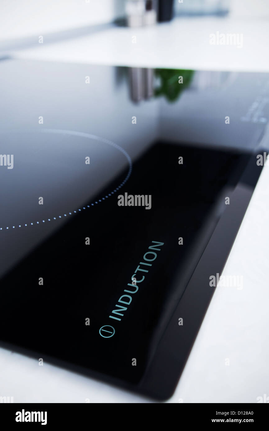Induction label on electrical hob Stock Photo - Alamy