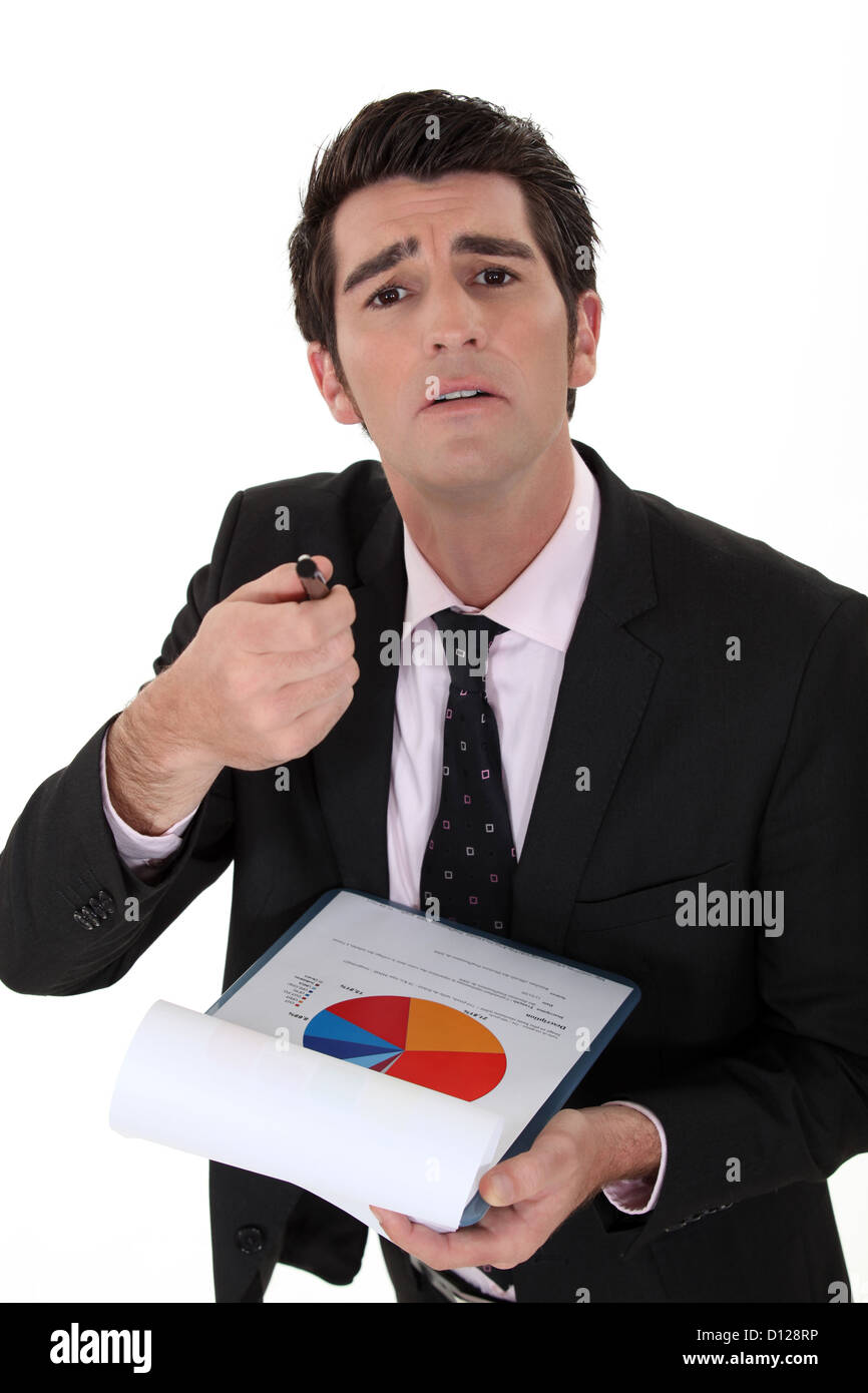 Expressive businessman with graph Stock Photo - Alamy