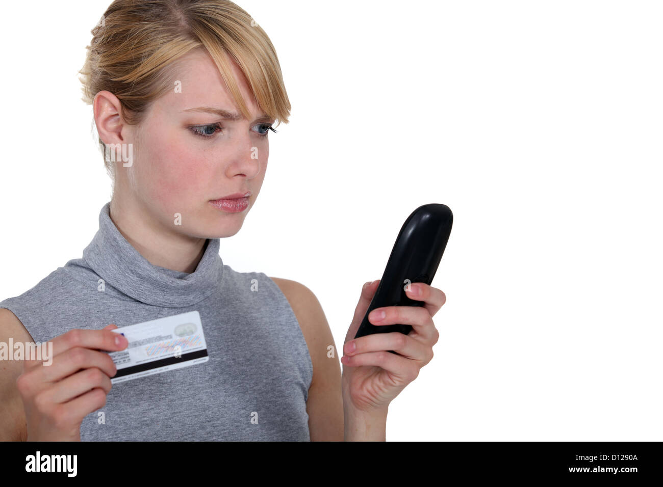 Woman calling her bank Stock Photo - Alamy
