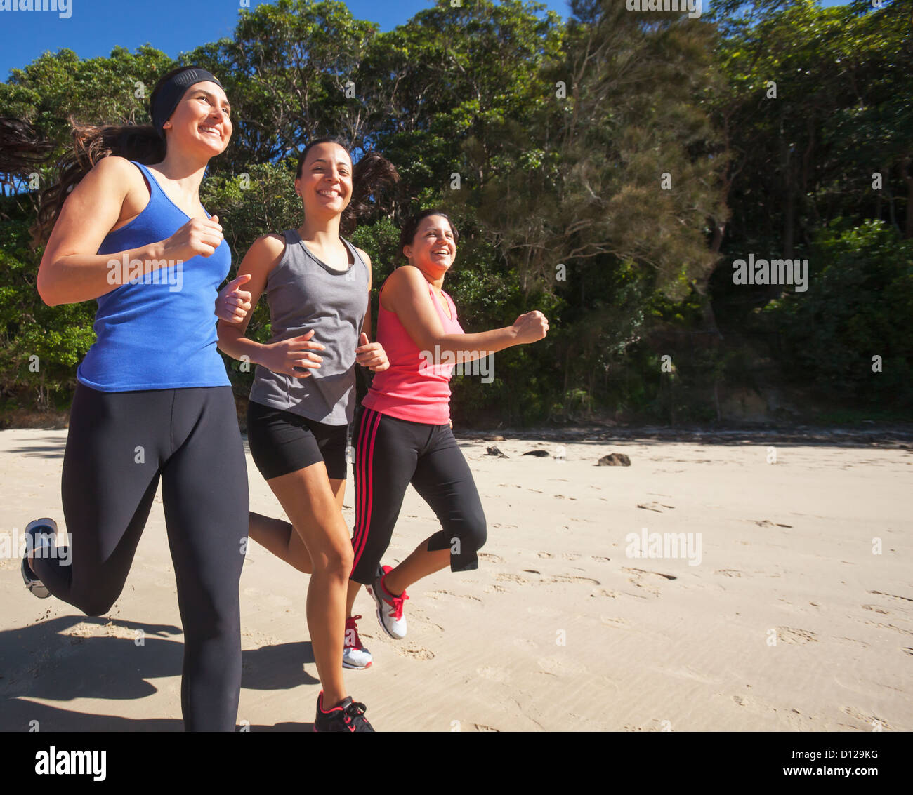 Three Women Running; Gold Coast Queensland Australia Stock Photo - Alamy