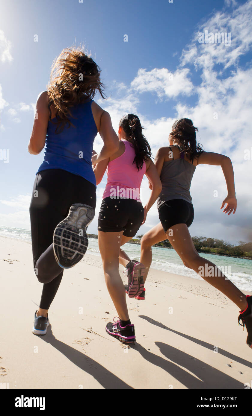 Three Women Running; Gold Coast Queensland Australia Stock Photo - Alamy