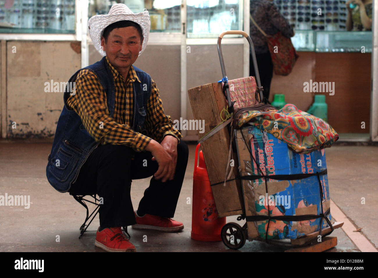 Man in the Naran Tuul 'Black' market, Ulaanbaatar Stock Photo - Alamy