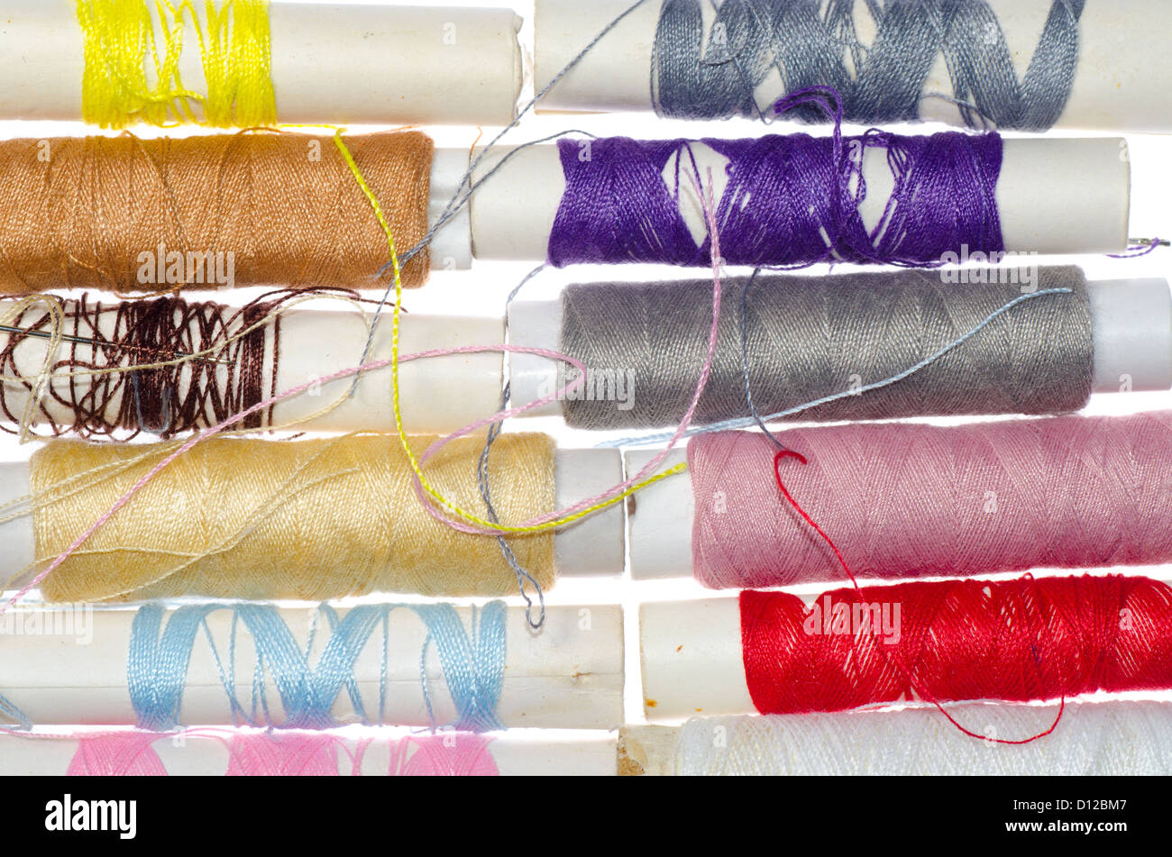 spool of thread isolated on white background Stock Photo - Alamy