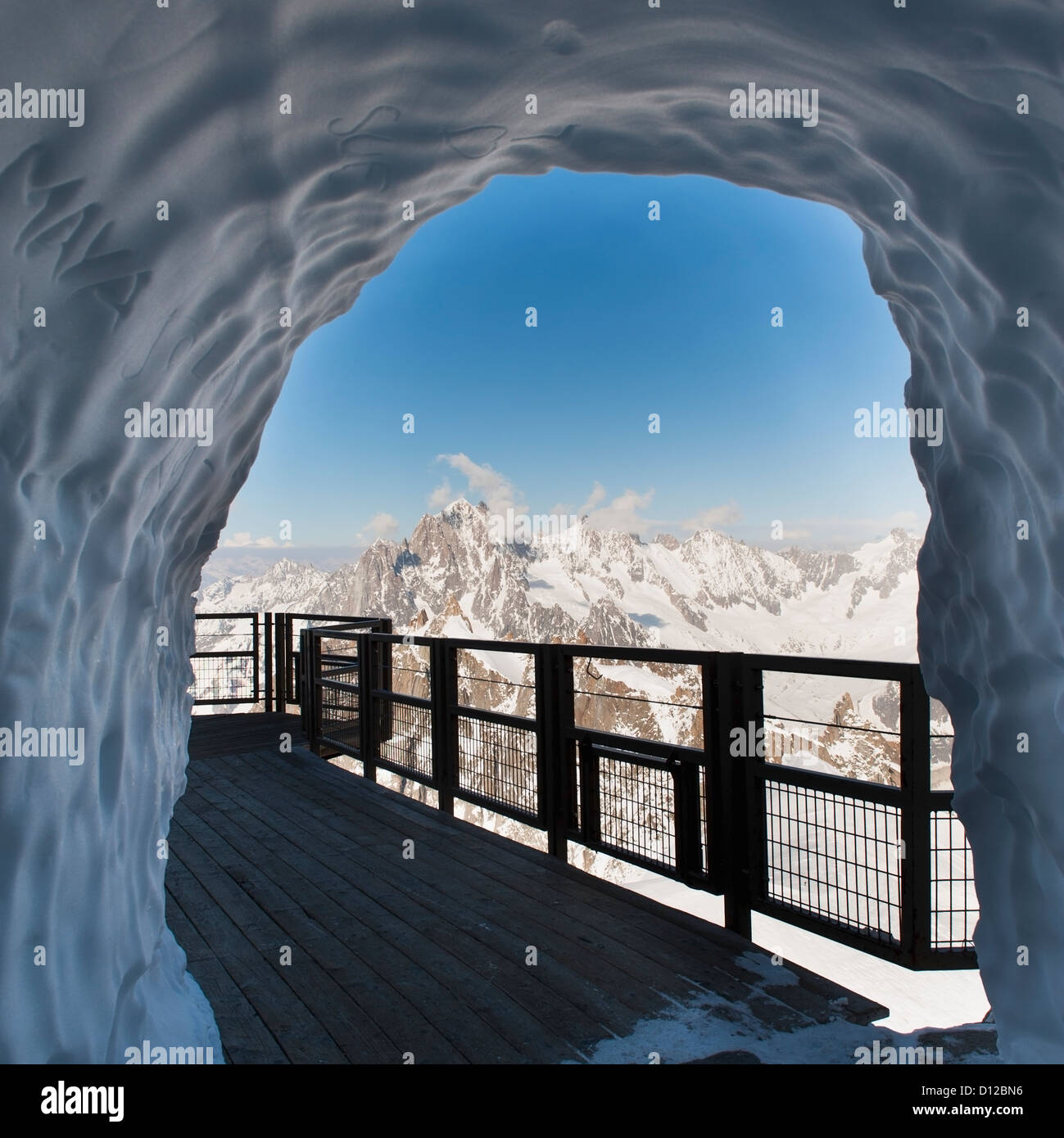 A Tunnel Through A Pile Of Snow On A Walkway; Chamonix-Mont-Blanc Rhone ...