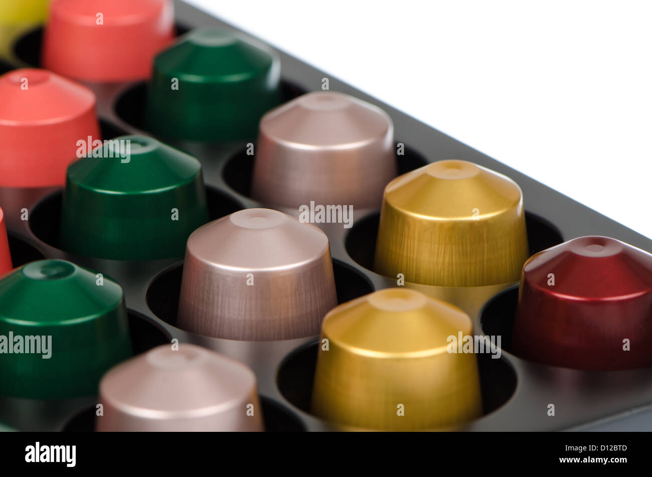 Coffee capsules for a coffee machine, close up view isolated on white ...