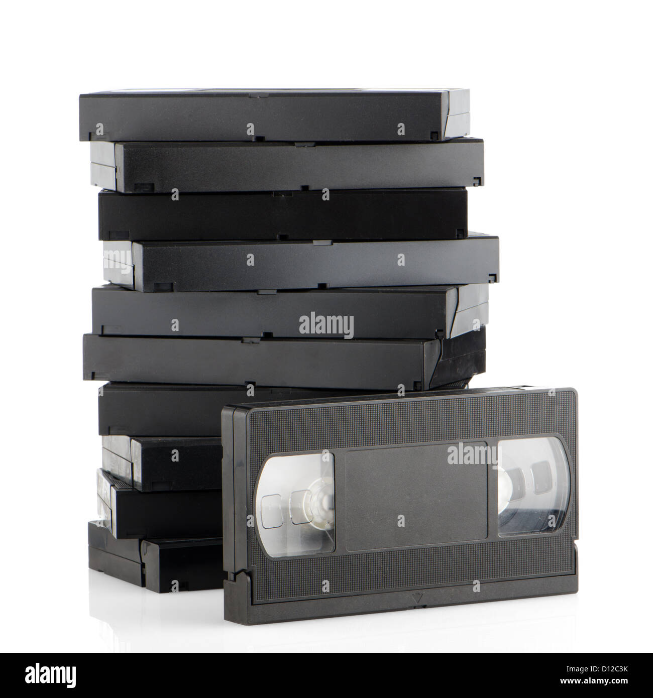 Pile of videotapes on white reflective background Stock Photo - Alamy