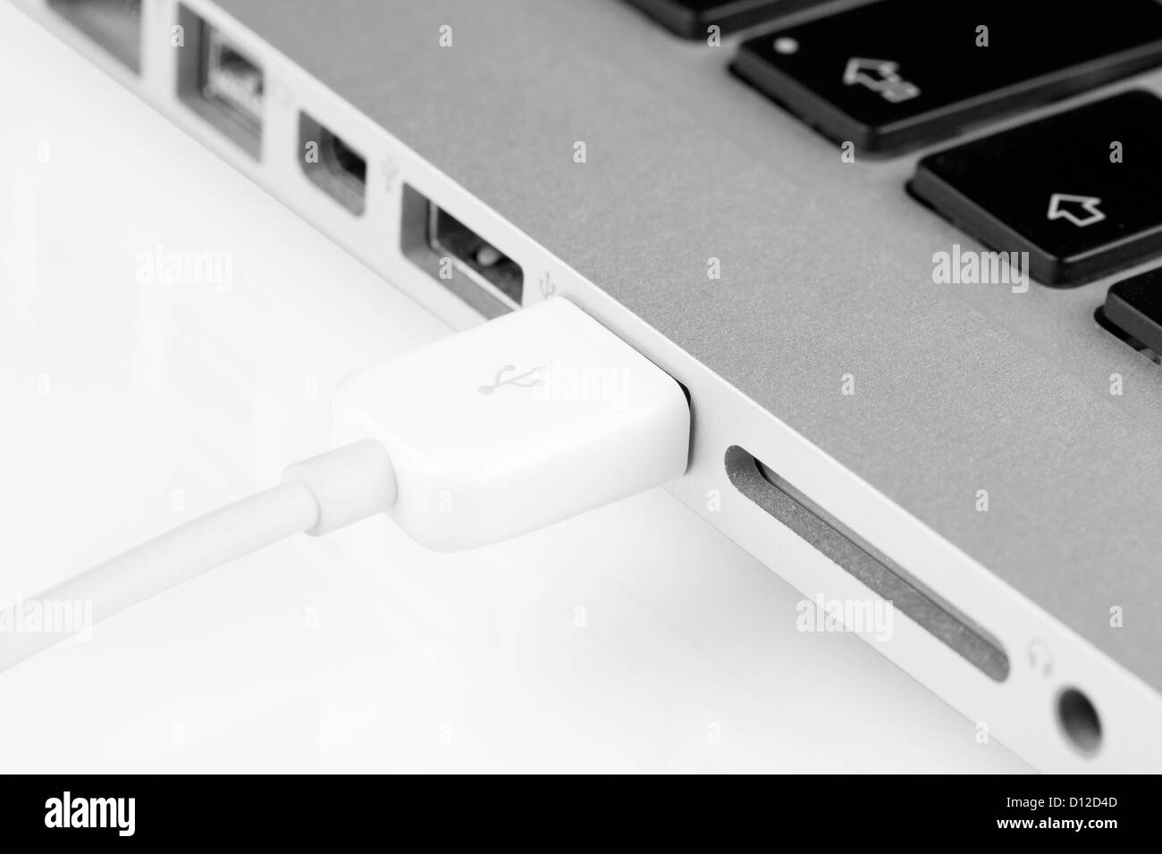 Laptop with usb connector. Isolated on white background Stock Photo - Alamy