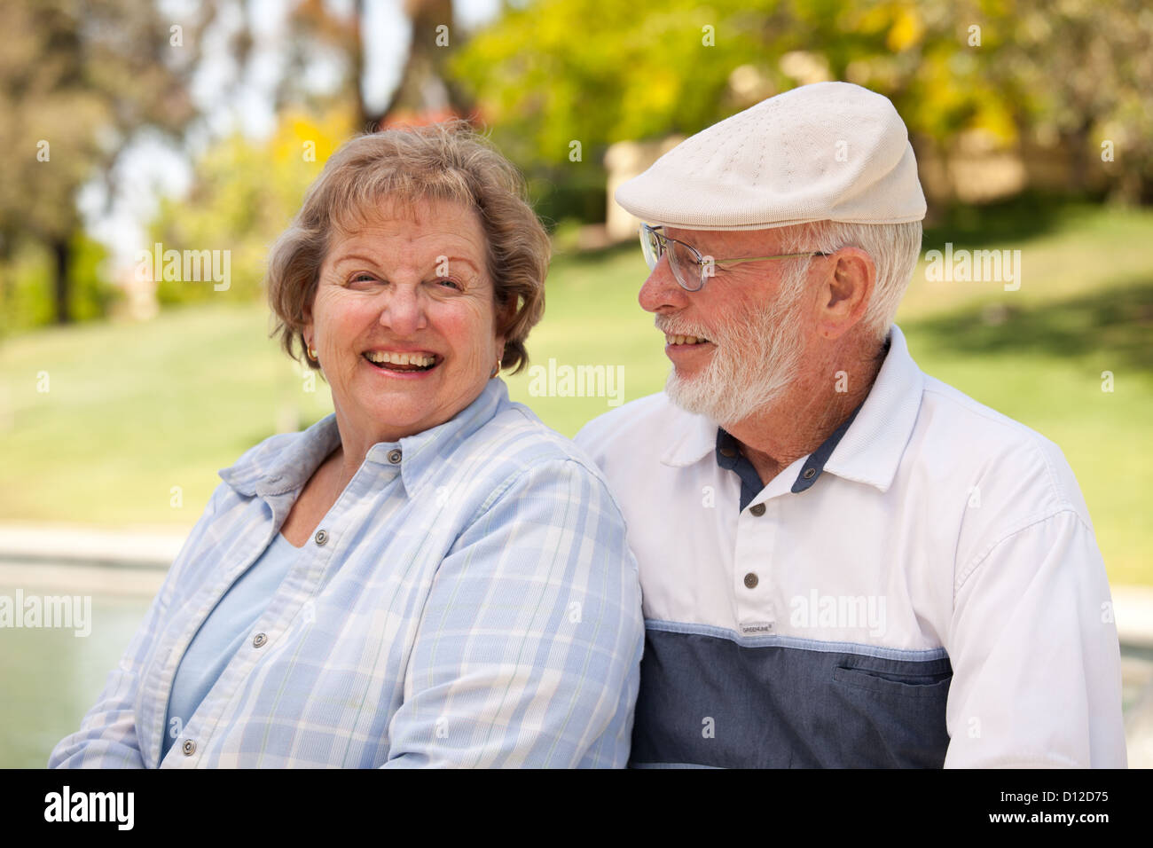 Happy Senior Couple Enjoying Each Other in The Park Stock Photo - Alamy