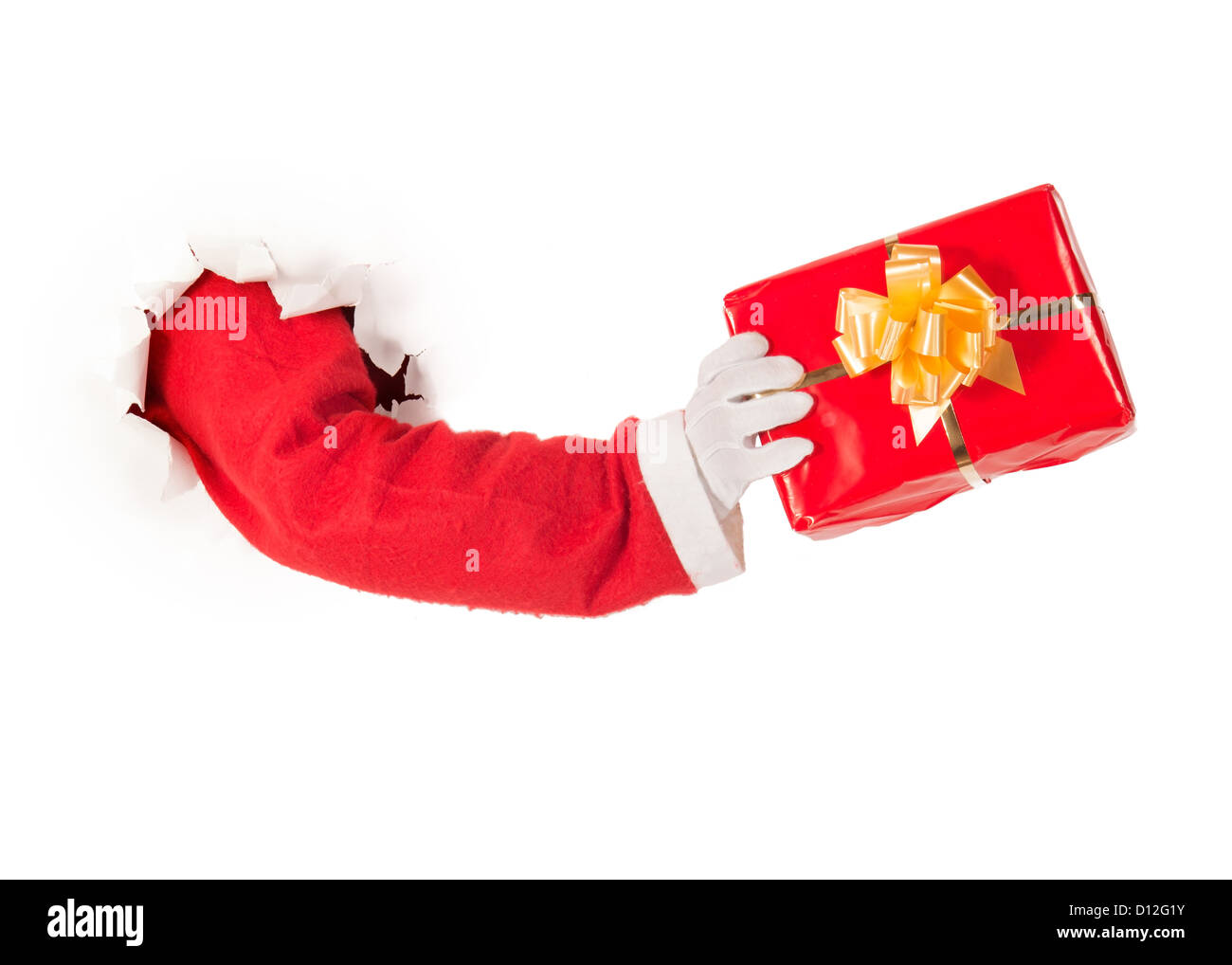 Santa Claus hand holding a gift Stock Photo - Alamy