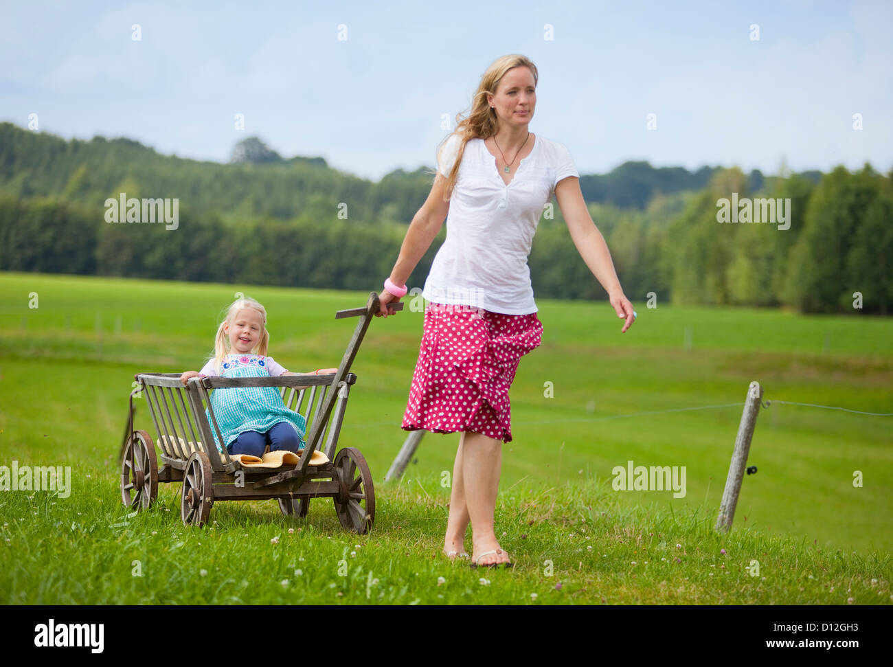 Pulling hand cart hi-res stock photography and images - Alamy