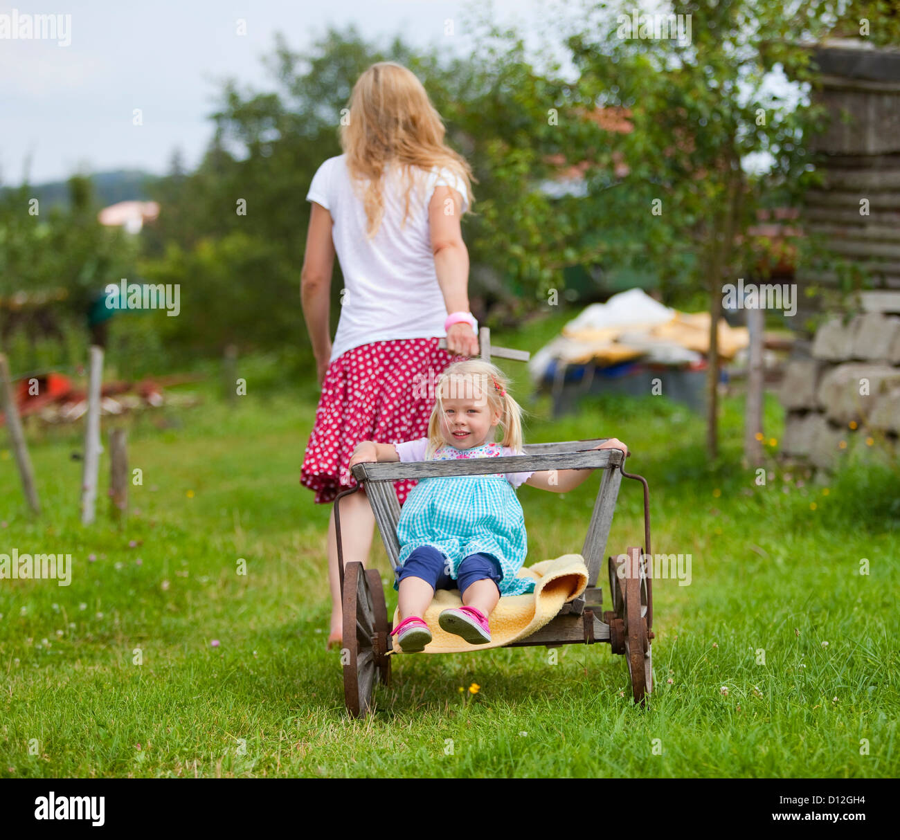 Pulling hand cart hi-res stock photography and images - Alamy