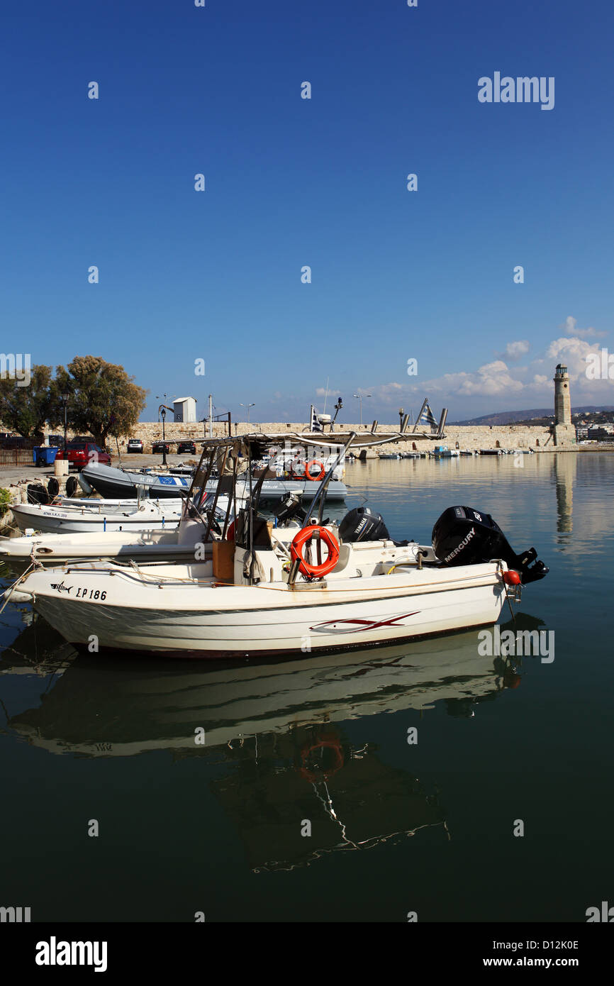 Boats in the Venetian harbour, by the Ottoman lighthouse, at Rethymno ...