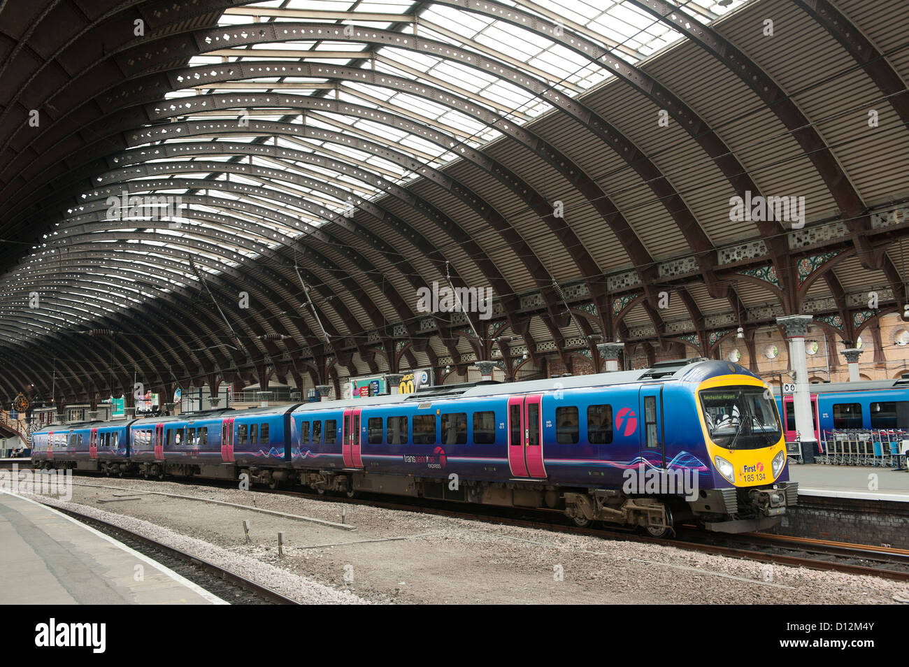 First Transpennine Express Class 185 passenger train waiting at a ...