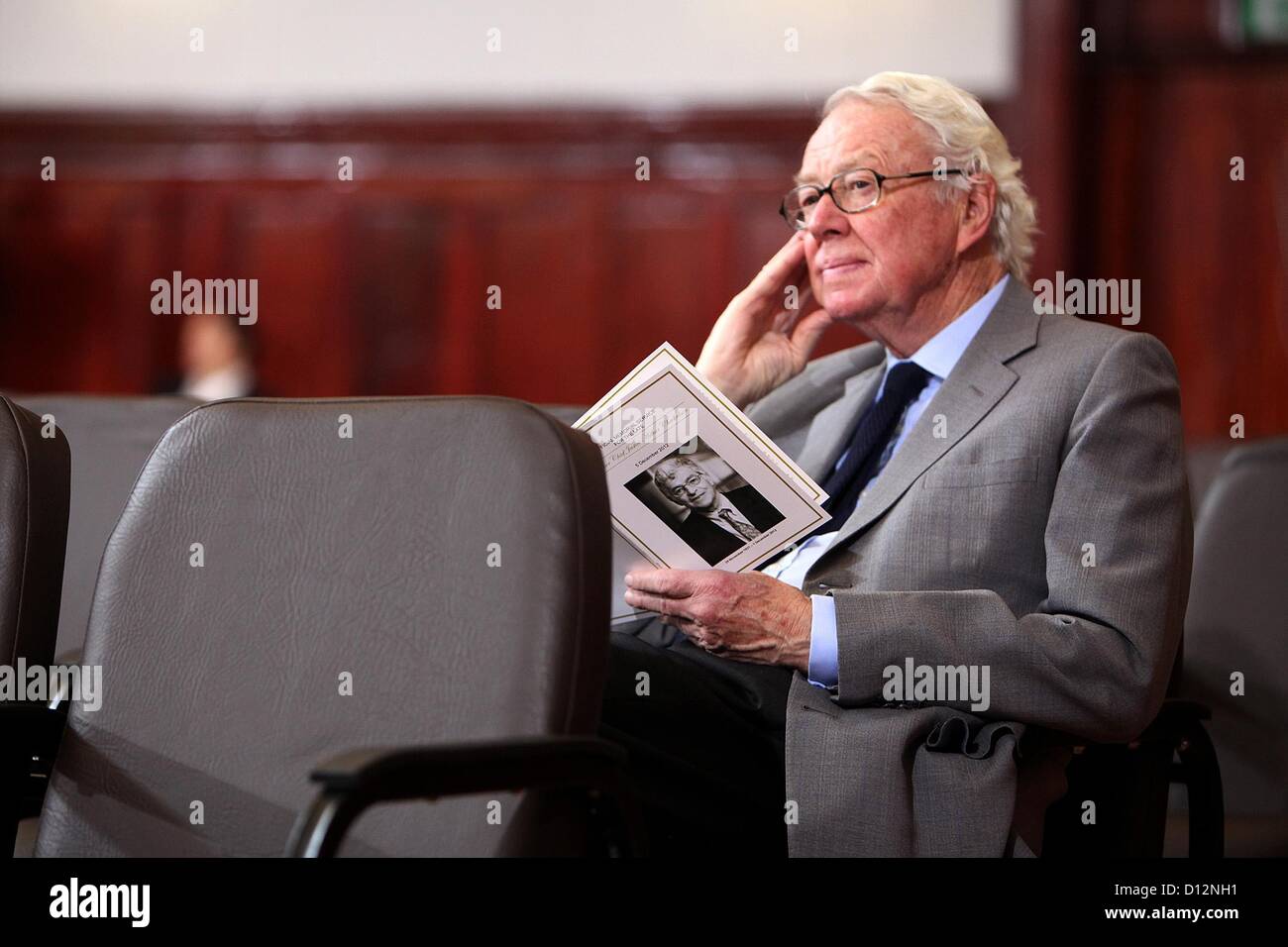 JOHANNESBURG, SOUTH AFRICA: A mourner paying his respects at the ...