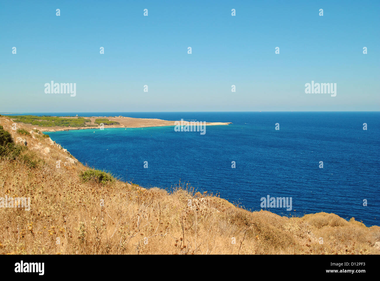 A spectacular blue sea and the typical golden grass near the eastern ...