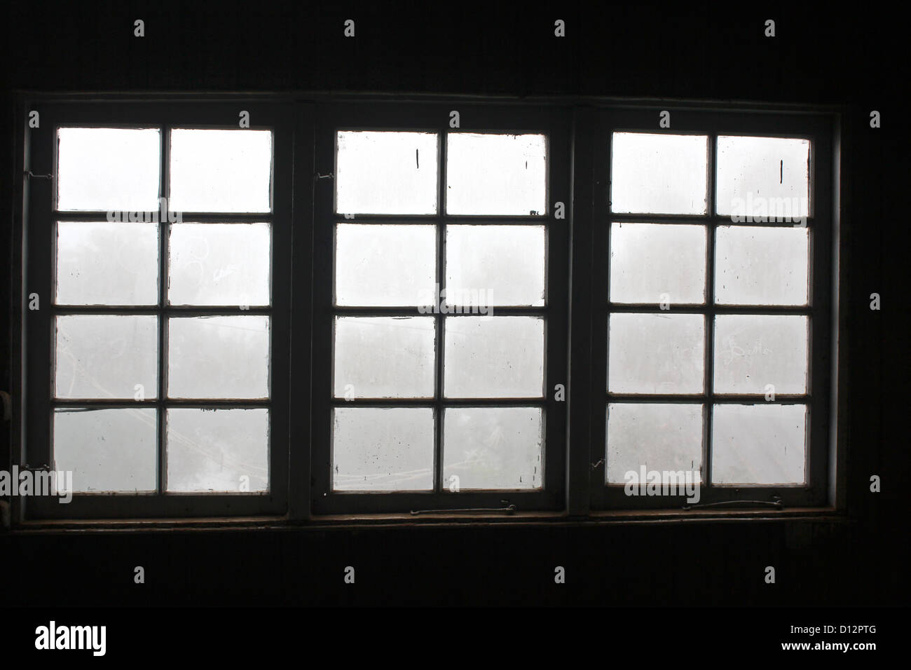 Silhouette of old window fog outside Stock Photo - Alamy