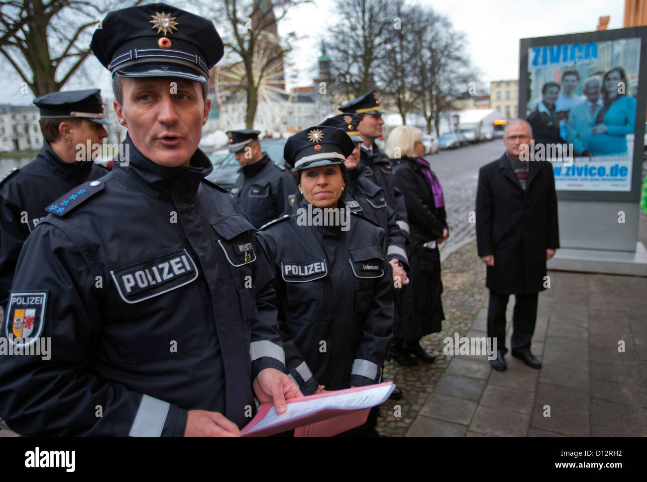 A poster for more civil courage is unveiled during the opening event of ...