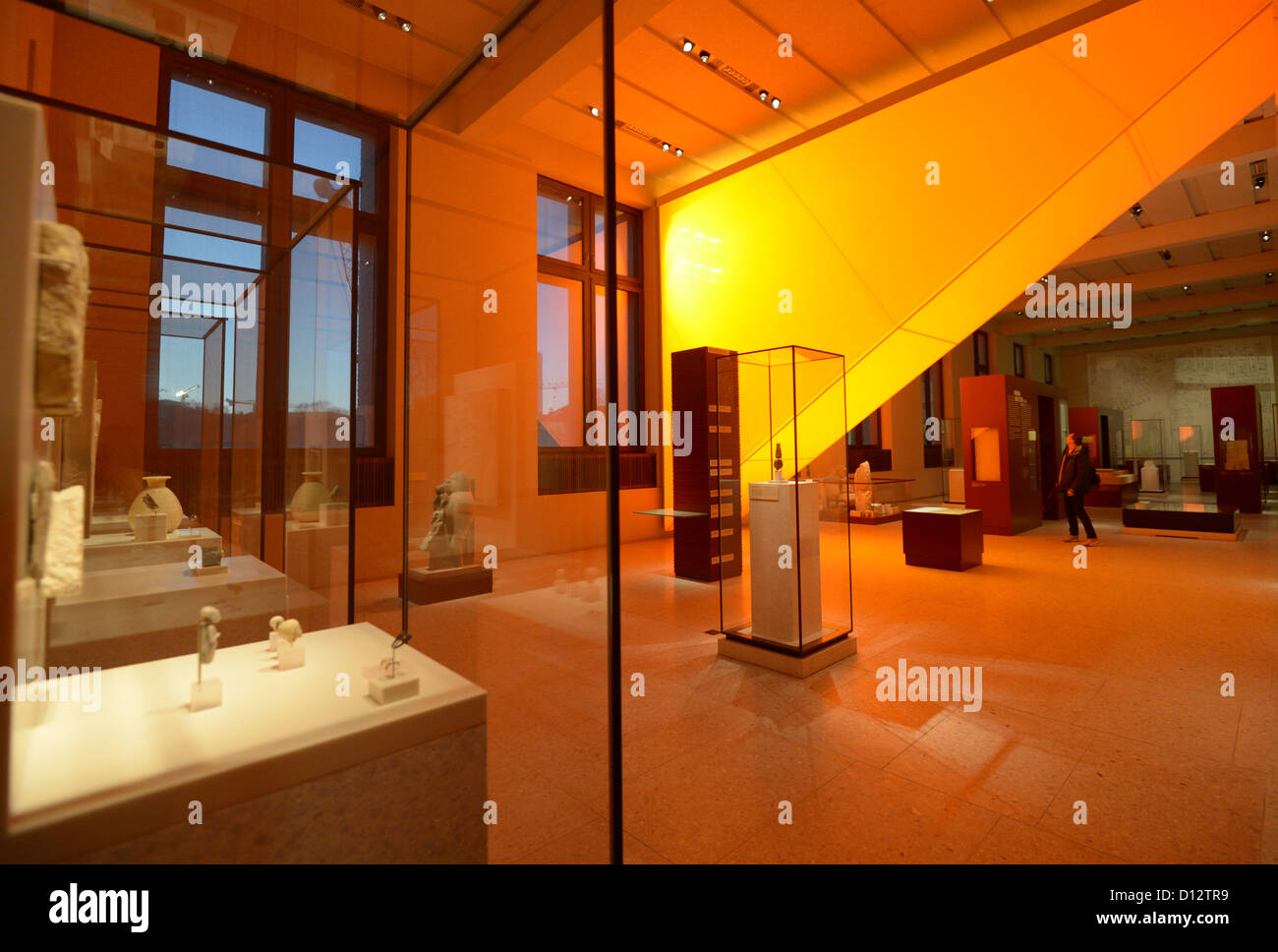 A person walks through the exhibition 'In the Light of Amarna. 100th ...