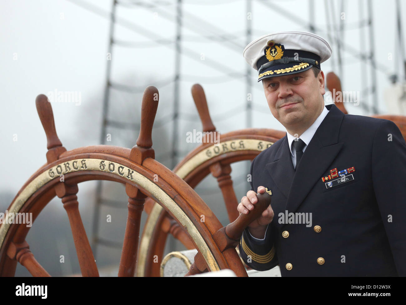 Helge Risch, commander of the Gorch Fock sail ship stands on deck as ...
