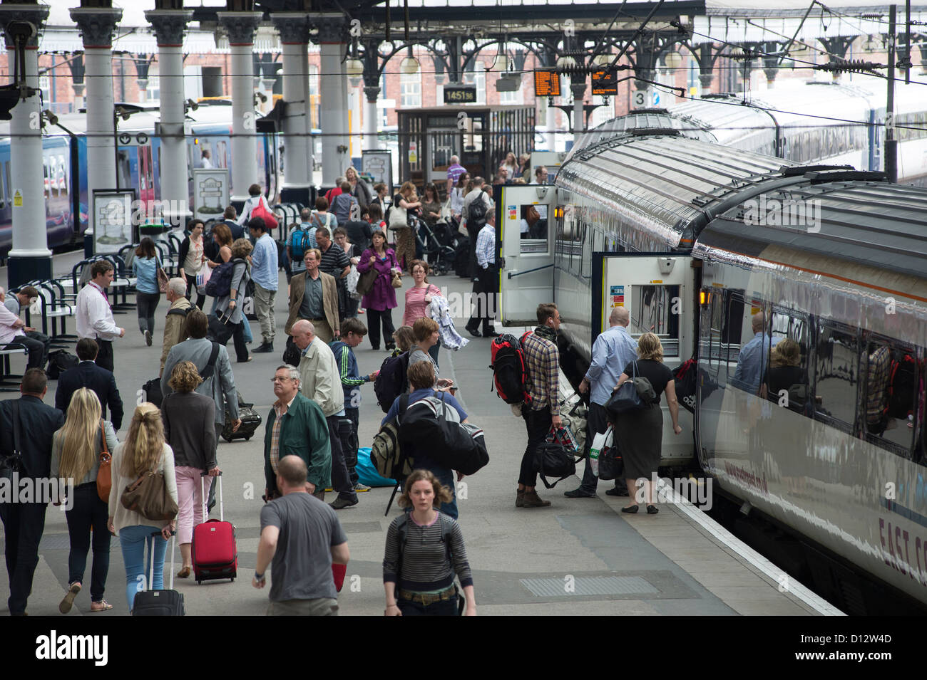 People waiting to board an East Coast Main Line train at York Railway ...