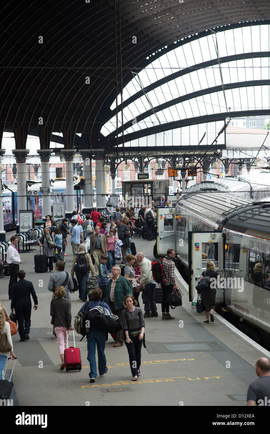 People waiting to board an East Coast Main Line train at York Railway ...