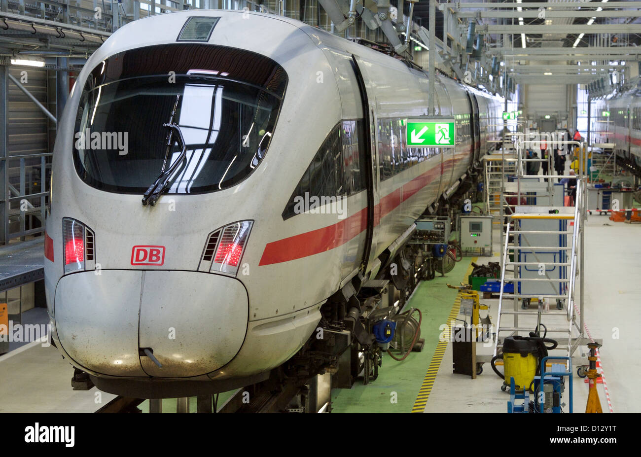An ICE train is parked in the maintenance hangar of German railway ...