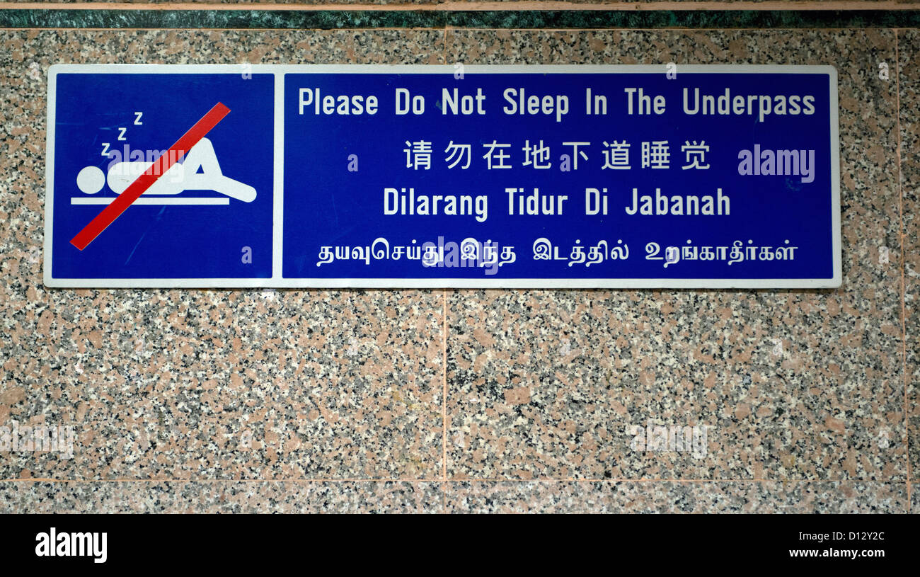 A sign that announces that sleeping is forbidden in the underpass is ...