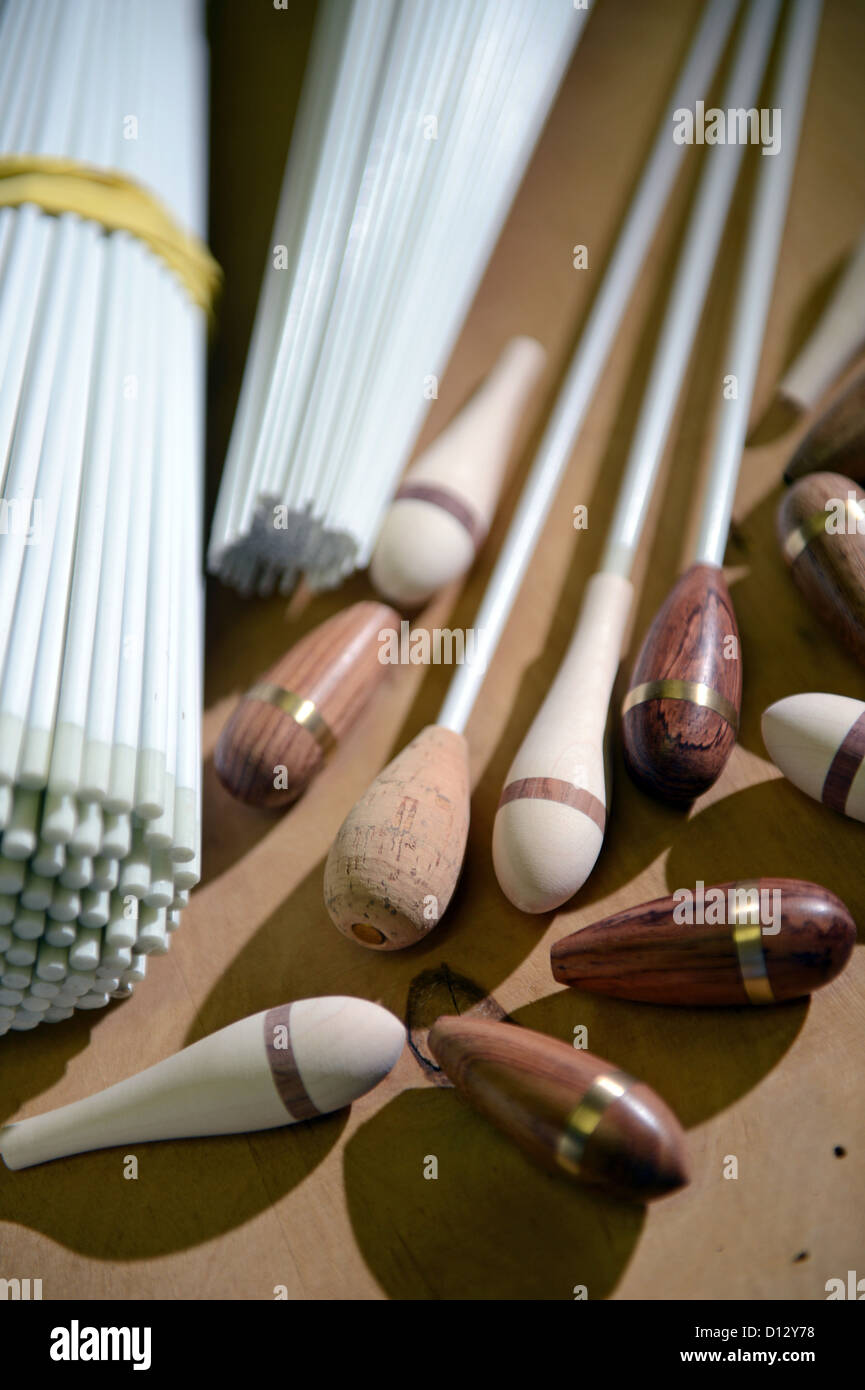 Wound wooden sticks and handles for batons are pictured at the baton ...