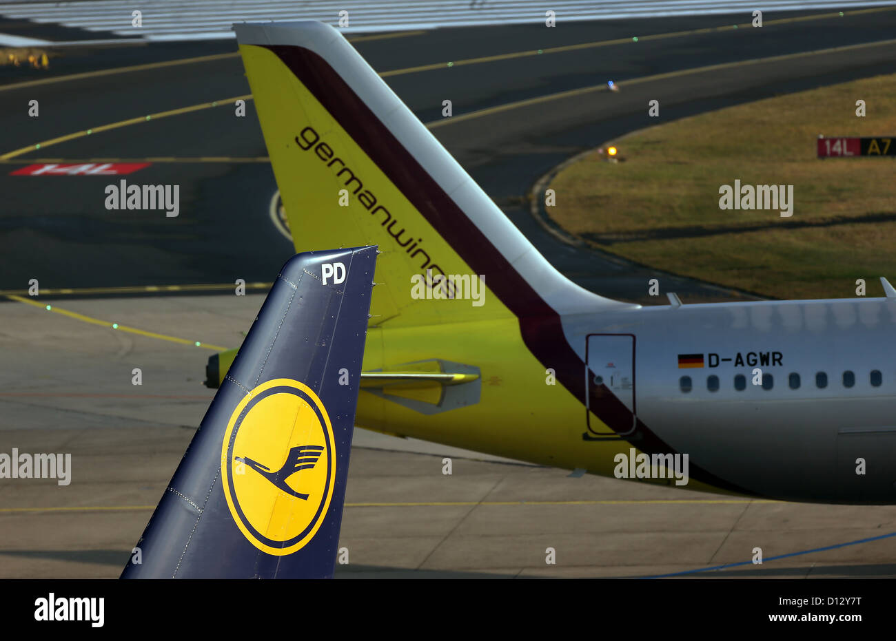 Jet airliners of airlines Lufthansa and Germanwings pass each other at ...