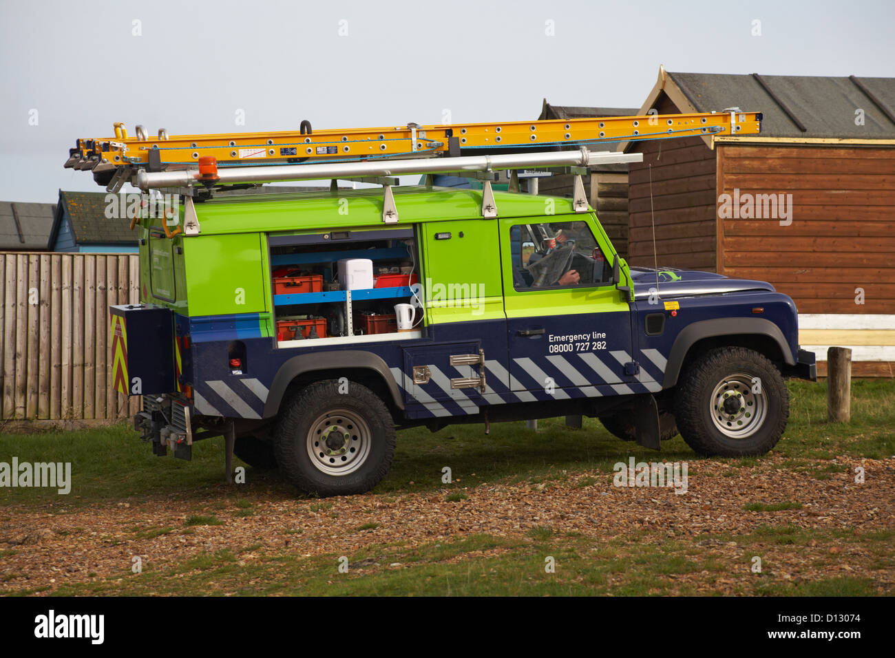 Scottish and Southern Energy vehicle with driver having a tea break ...