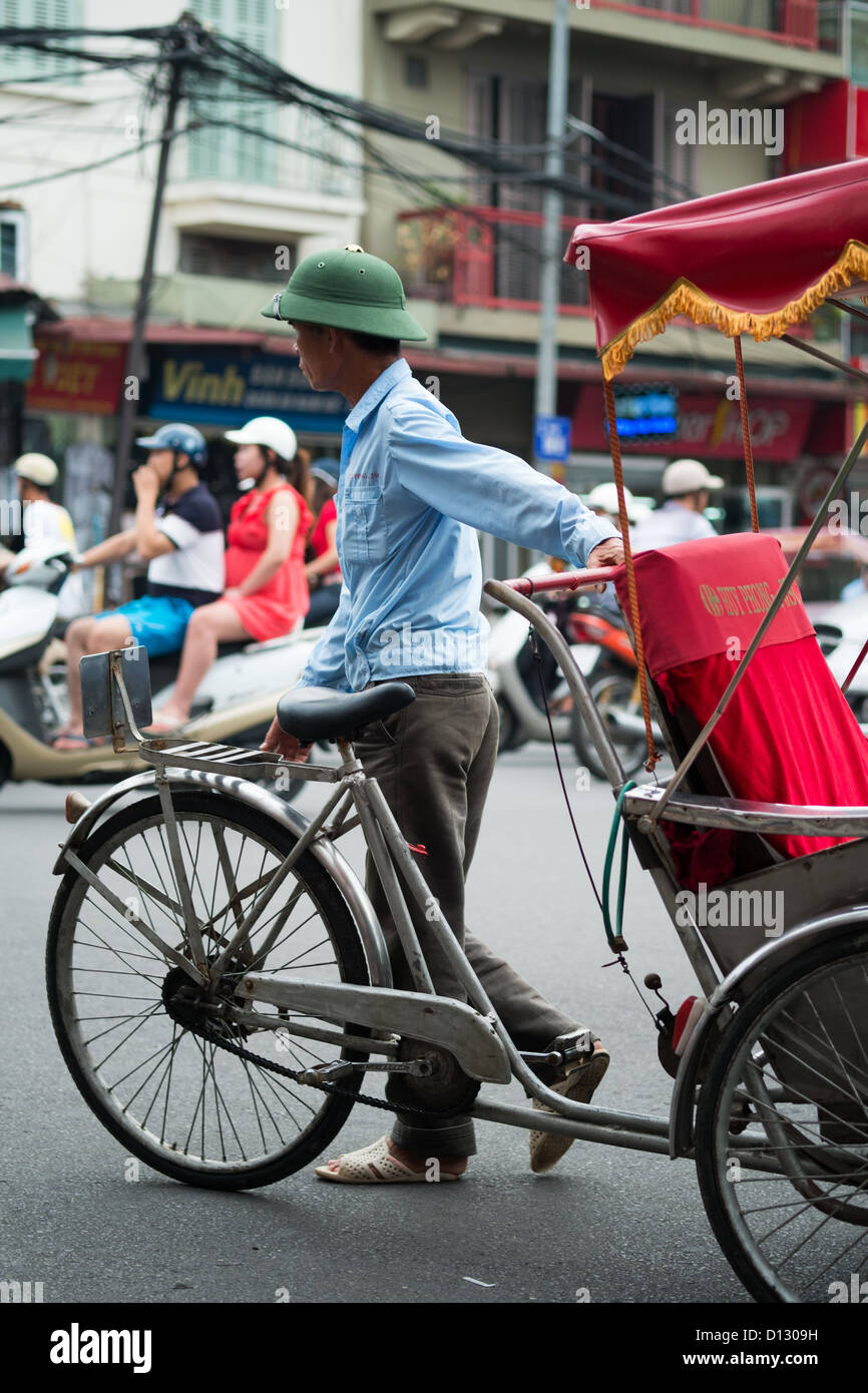 Rickshaw riders waiting for customers in Hanoi Vietnam South East Asia ...