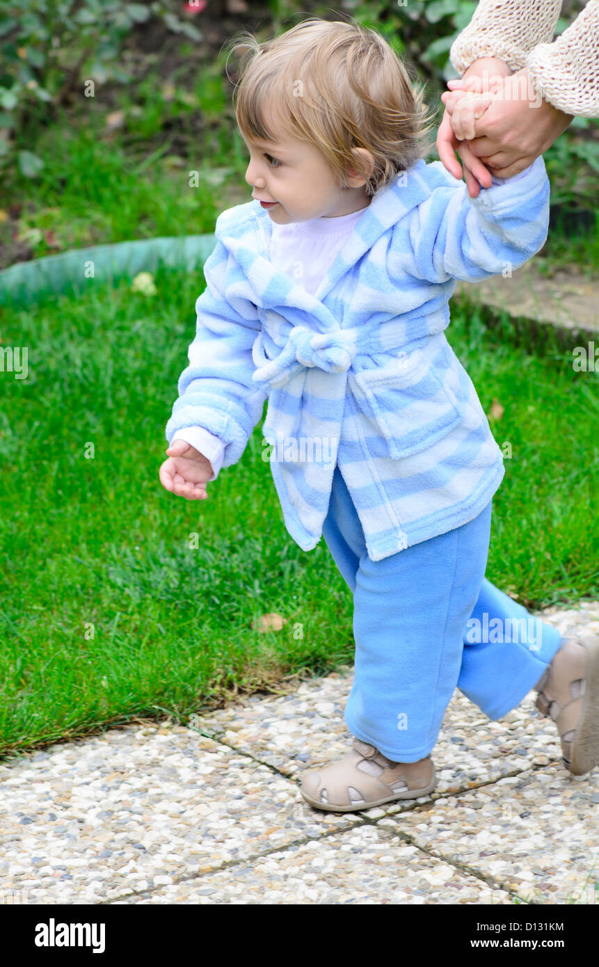 a little boy making his first steps Stock Photo - Alamy