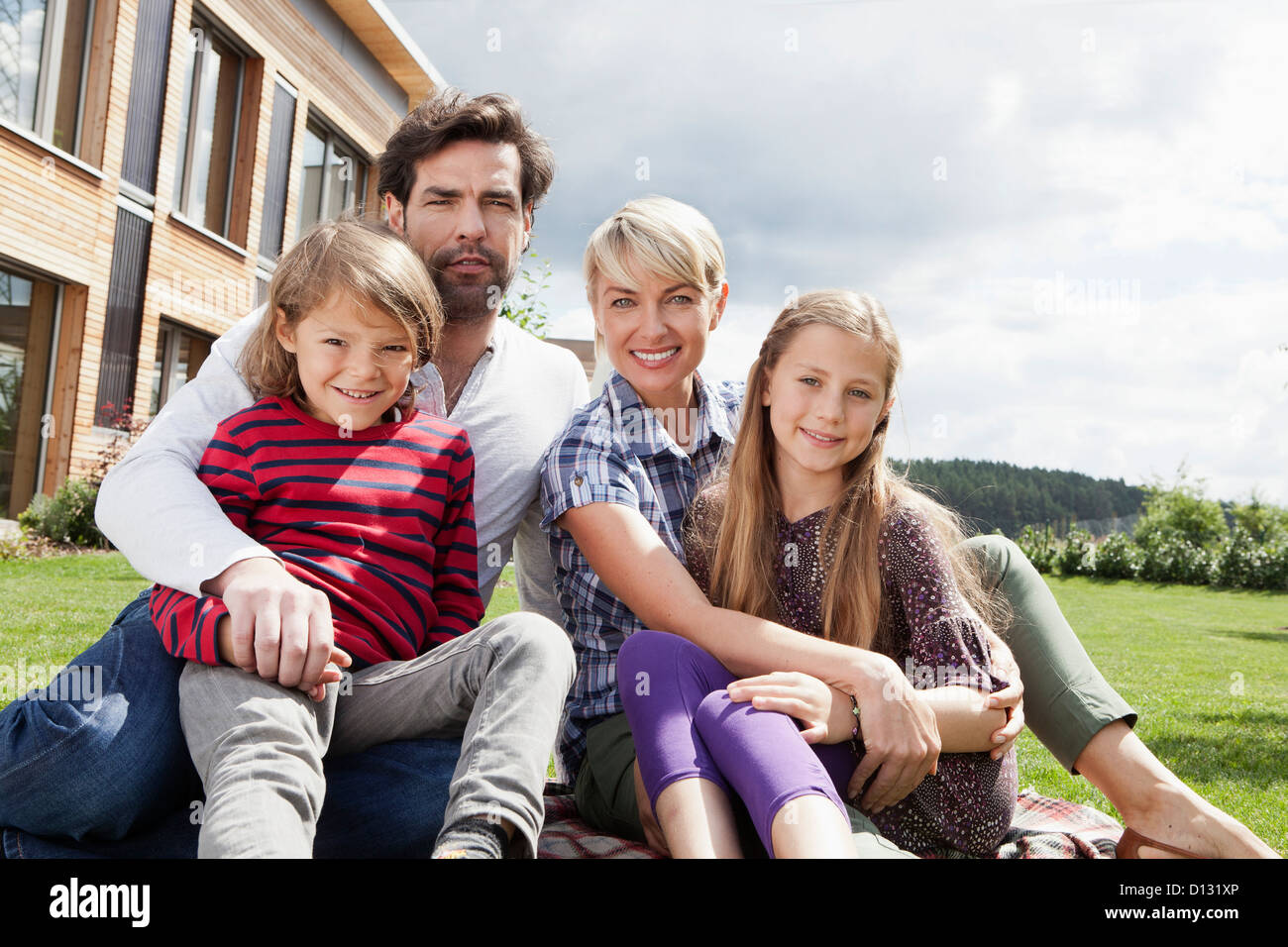 Germany, Bavaria, Nuremberg, Portrait of family in front of house Stock ...