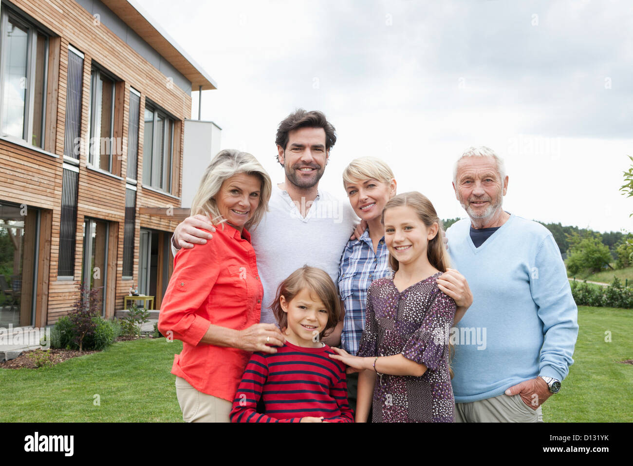 Germany, Bavaria, Nuremberg, Portrait of family in front of house Stock ...