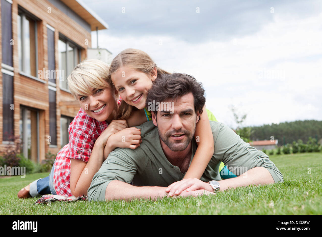 Germany, Bavaria, Nuremberg, Portrait of family in front of house Stock ...