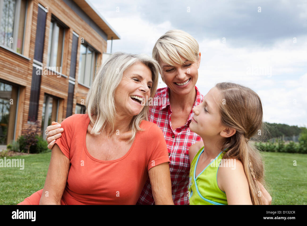 Germany, Bavaria, Nuremberg, Family in front of house Stock Photo - Alamy