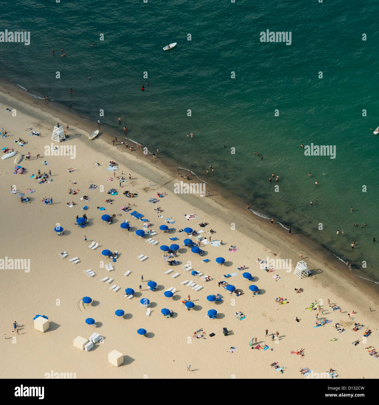 High Angle View Of Chairs And Umbrellas On The Beach Along Lake ...