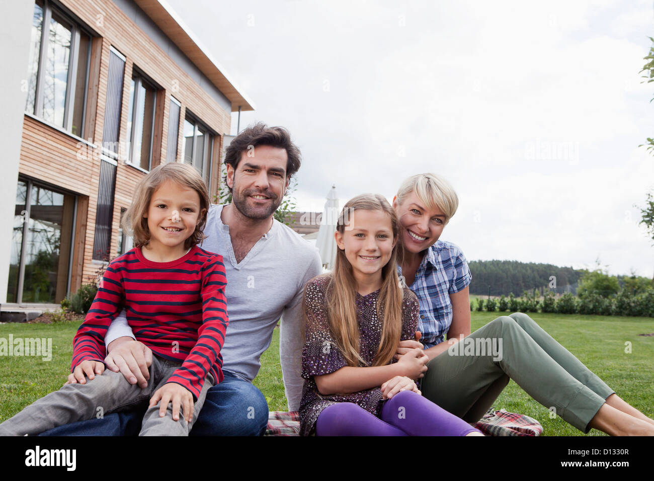 Germany, Bavaria, Nuremberg, Portrait of family in front of house Stock ...