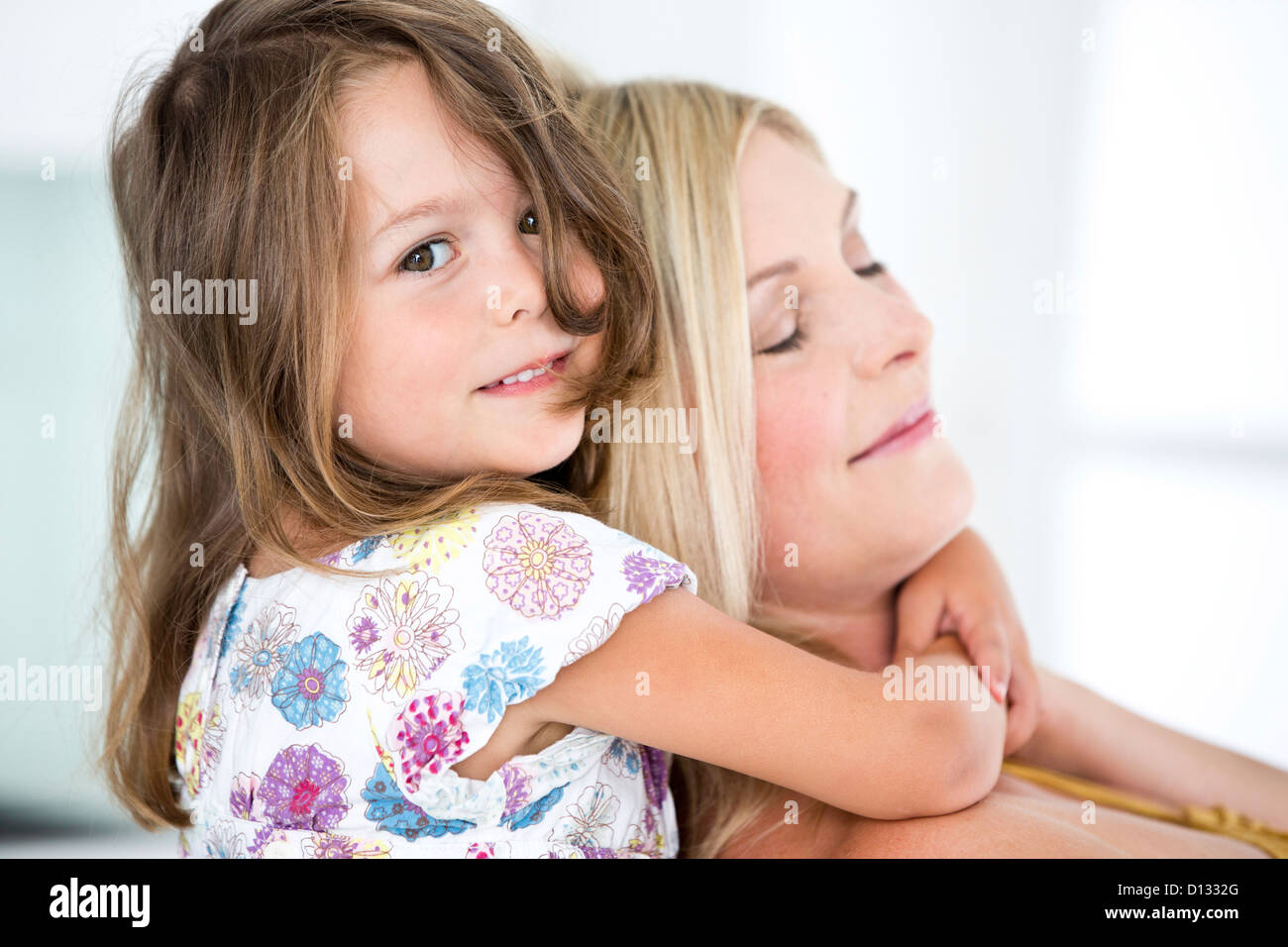 Germany, Mother and daughter smiling, close-up Stock Photo - Alamy
