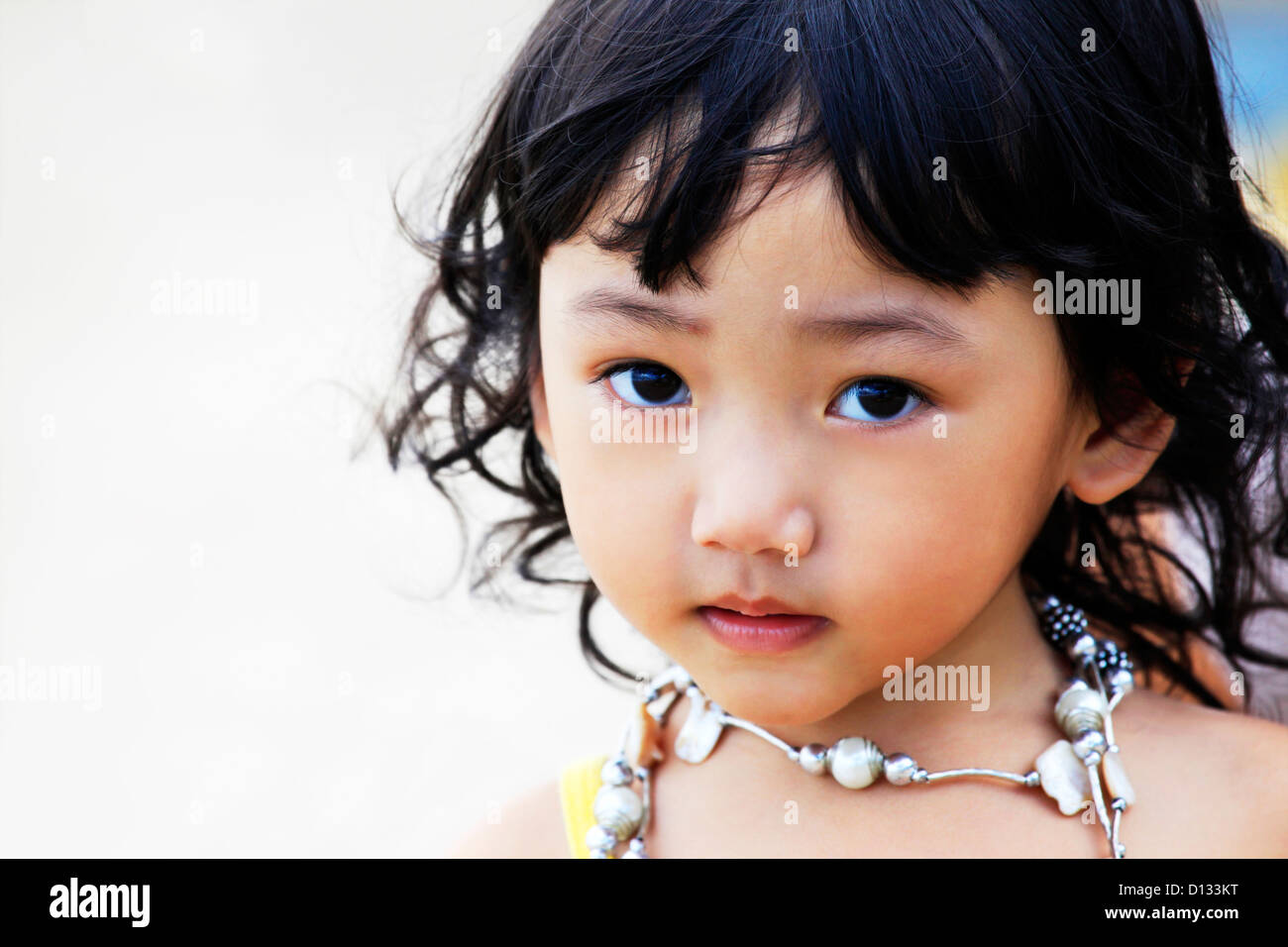 Portrait of the beautiful small Asian girl. Indonesia. Java Stock Photo ...