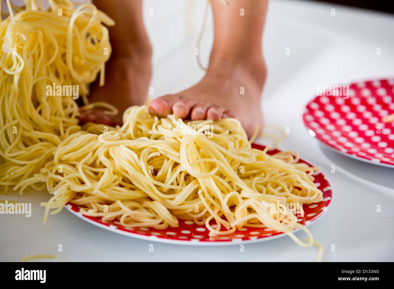 Girl standing in spaghetti hi-res stock photography and images - Alamy