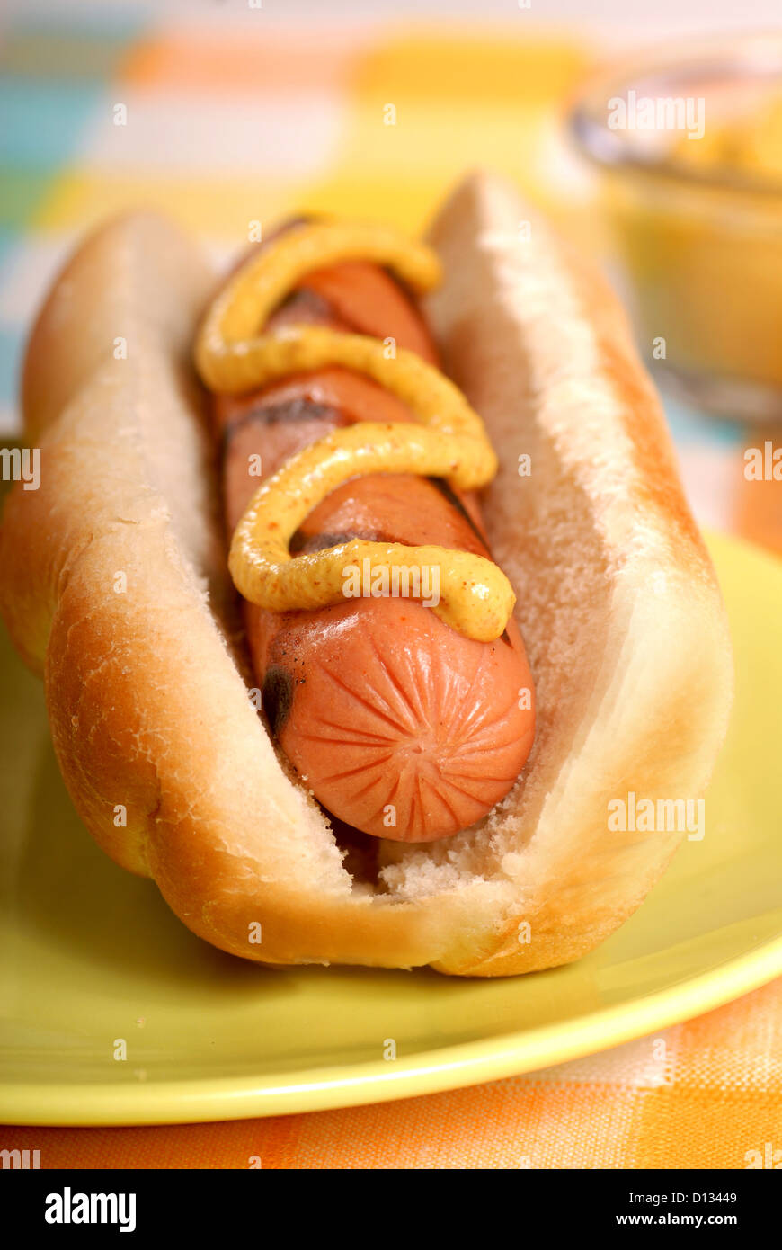 Freshly grilled hot dog with spicy mustard Stock Photo - Alamy