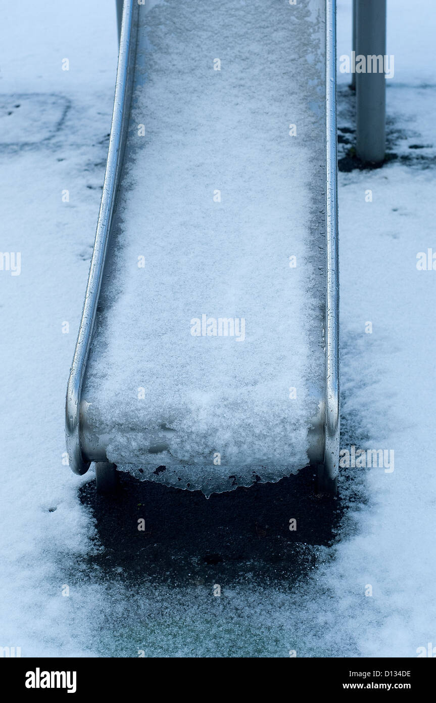 Slide and snow Stock Photo - Alamy