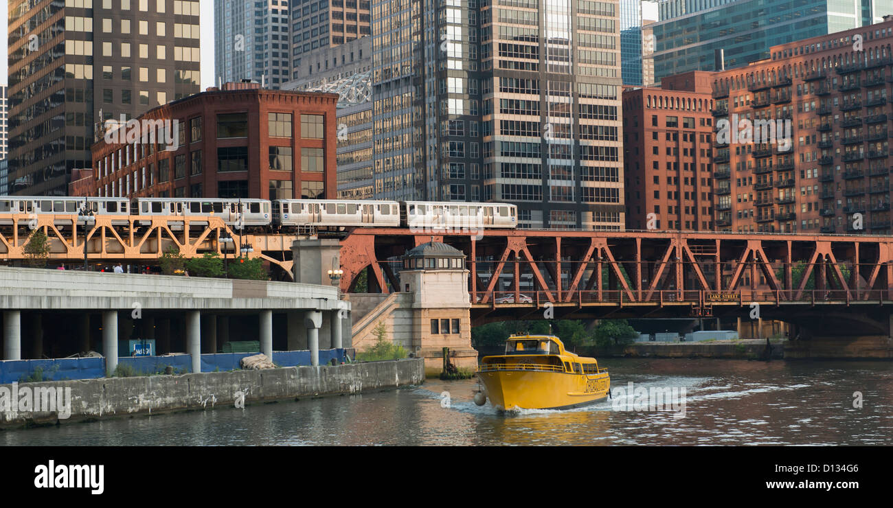 A Yellow Boat In The River Going Under A Bridge With The Train And ...