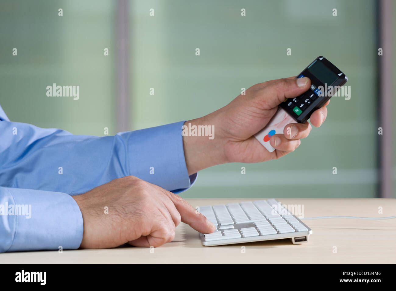 Mid adult man using tan generator hi-res stock photography and images ...