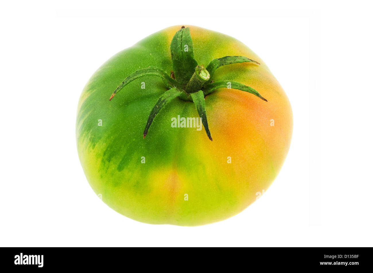 unripe green tomato isolated on white background Stock Photo - Alamy