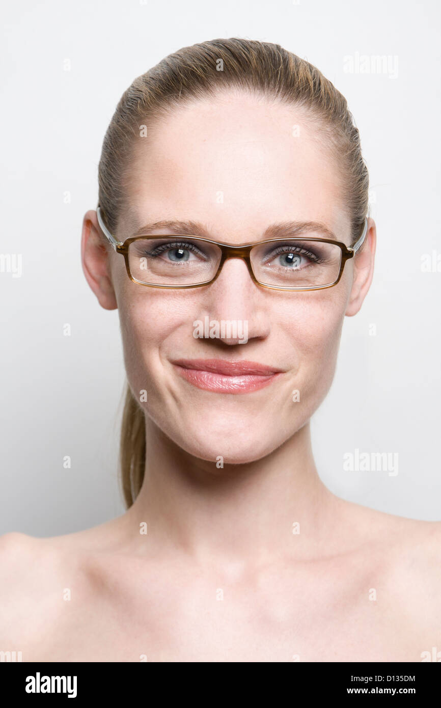 Young woman smiling, portrait Stock Photo - Alamy