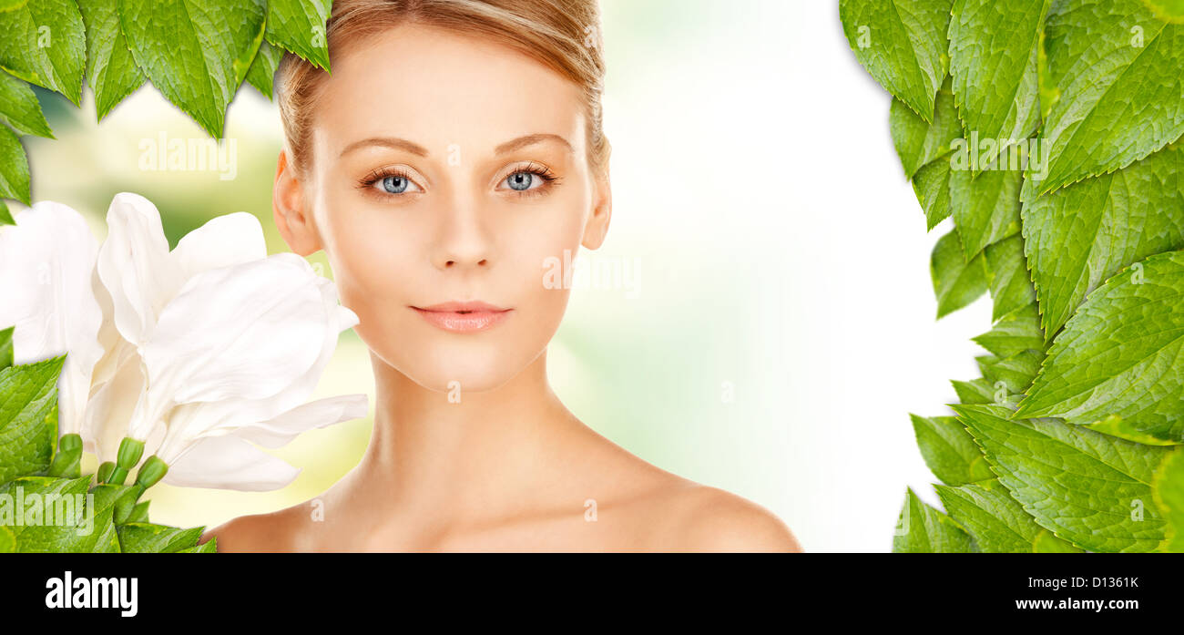 beautiful woman with madonna lily Stock Photo - Alamy