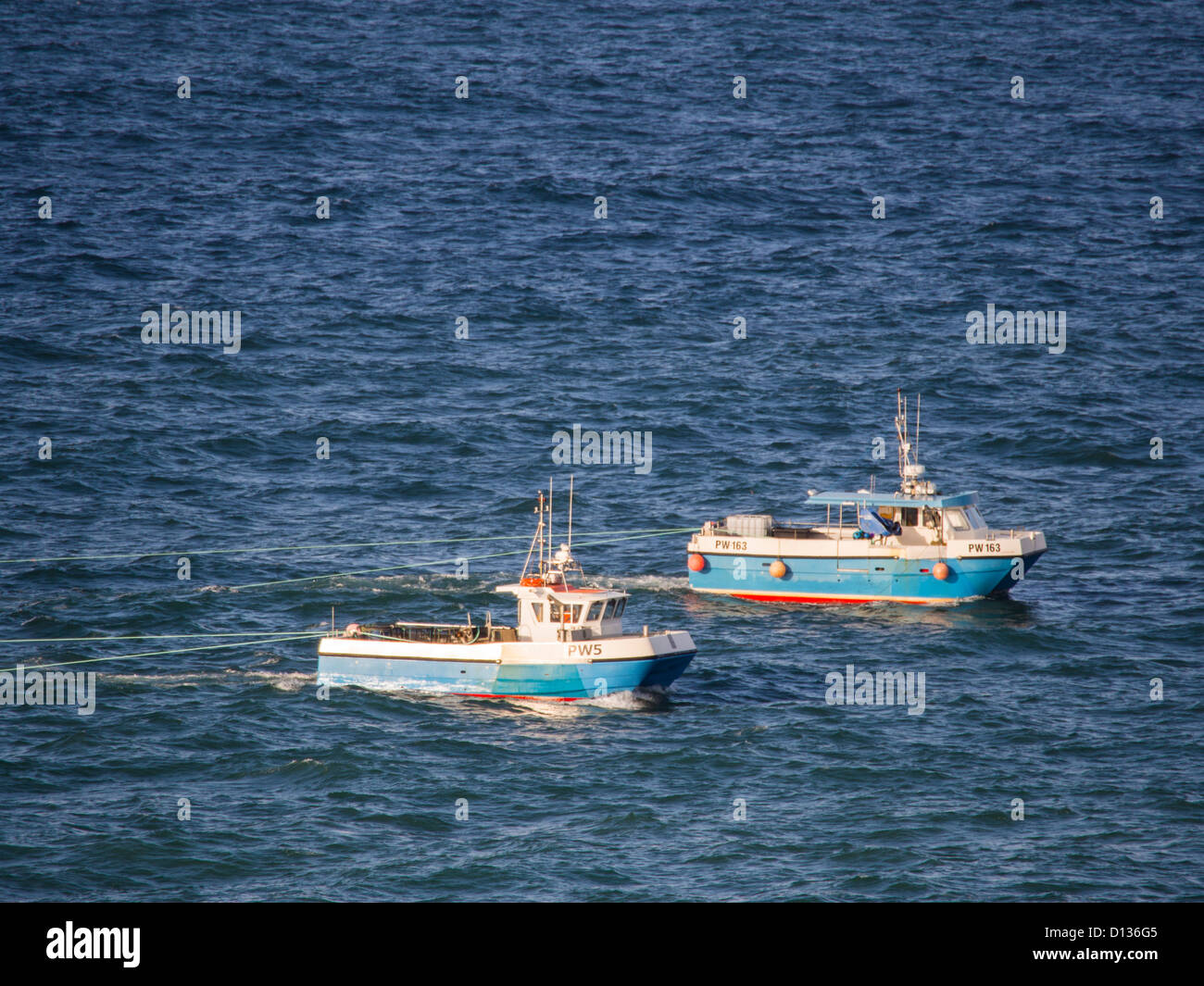 Two fishing boats, pair trawling near Port Isaac, Cornwall, UK Stock ...